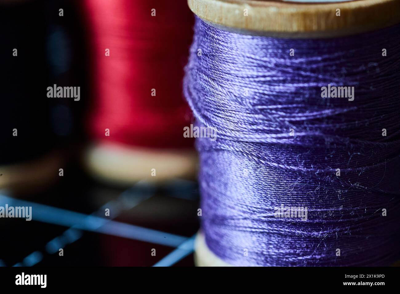 Vibrant Purple Thread Spool Texture with Red Contrast, Macro Side View ...