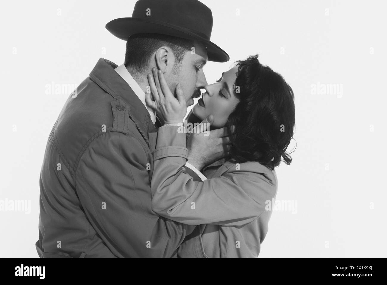 Portrait of happy young couple, man and woman in retro-styled clothes ...