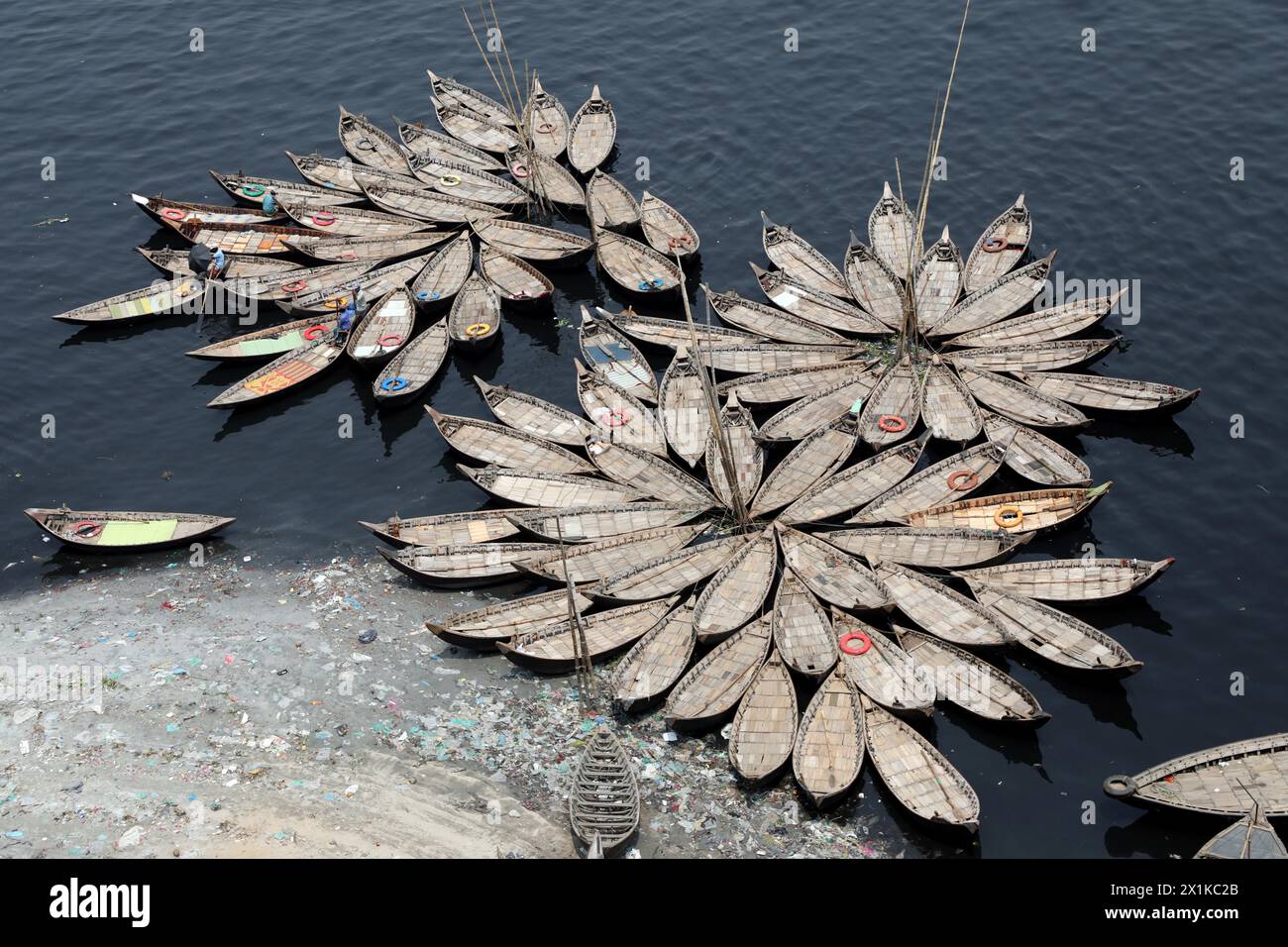 DHAKA, BANGLADESH - APRIL 16: Empty Boats float parked in the banks of ...