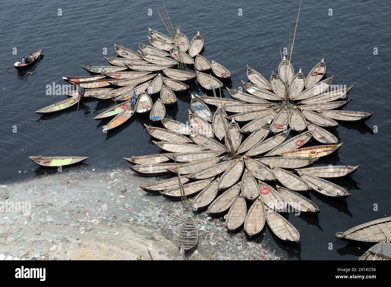 DHAKA, BANGLADESH - APRIL 16: Empty Boats float parked in the banks of ...