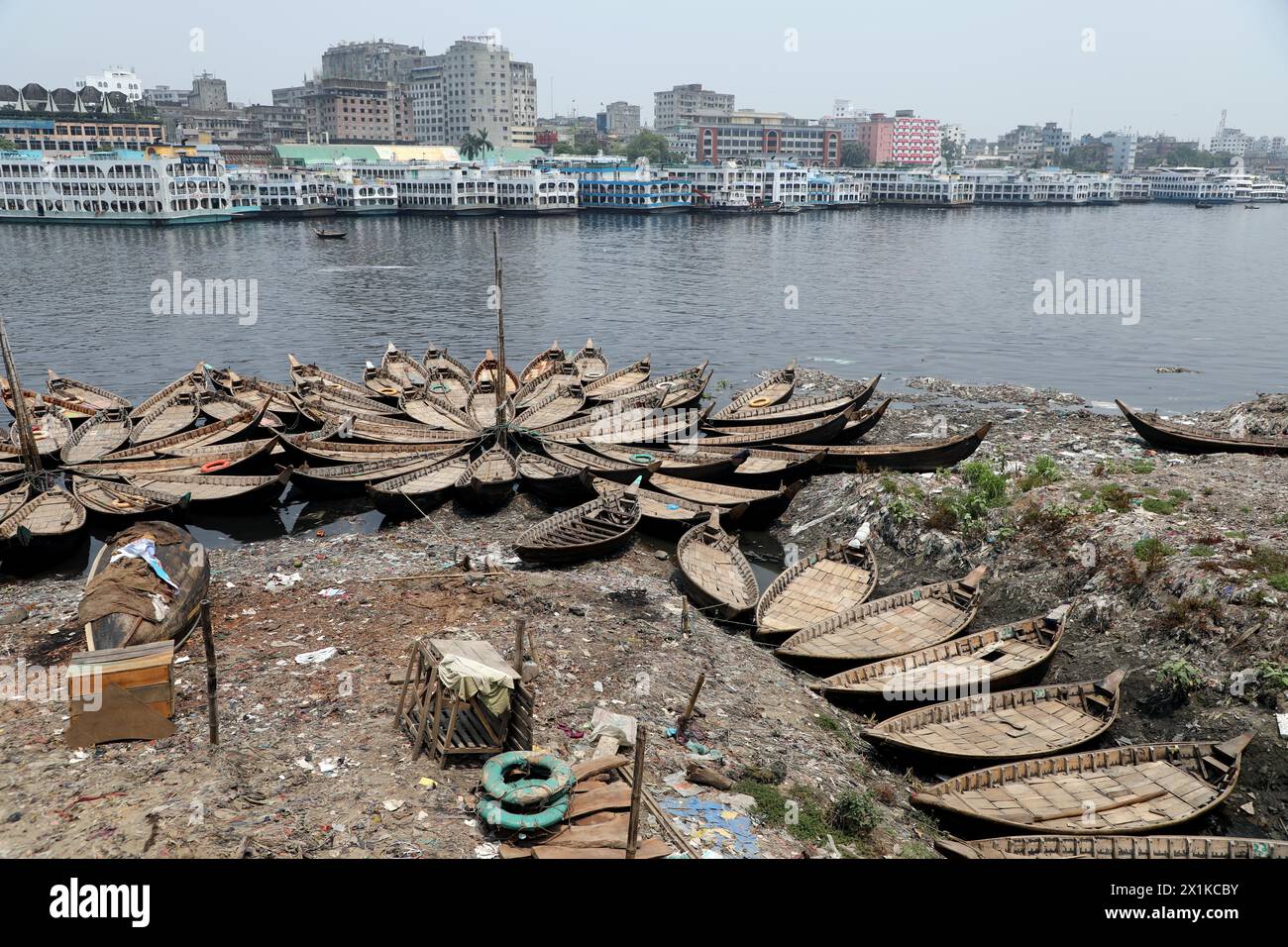 DHAKA, BANGLADESH - APRIL 16: Empty Boats float parked in the banks of ...