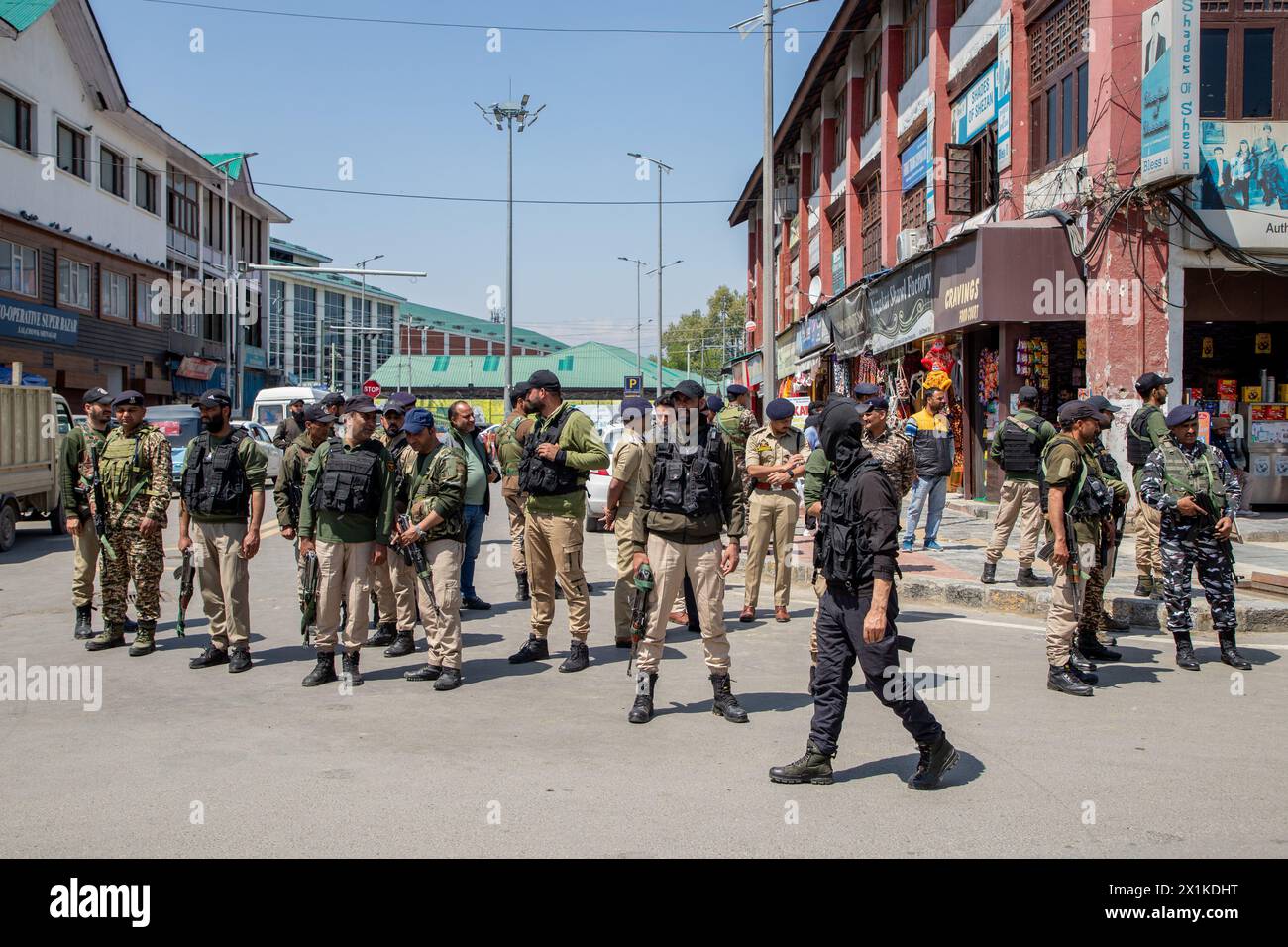 Srinagar, India. 17th Apr, 2024. Indian paramilitary troopers stand on ...