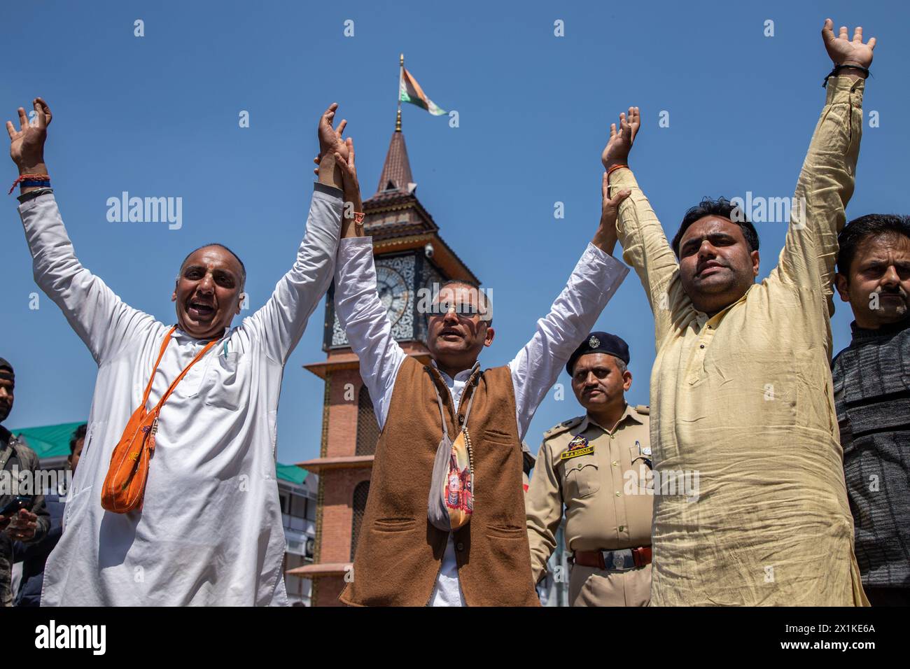 Srinagar, India. 17th Apr, 2024. Hindu devotees dance during a religious procession to celebrate ...