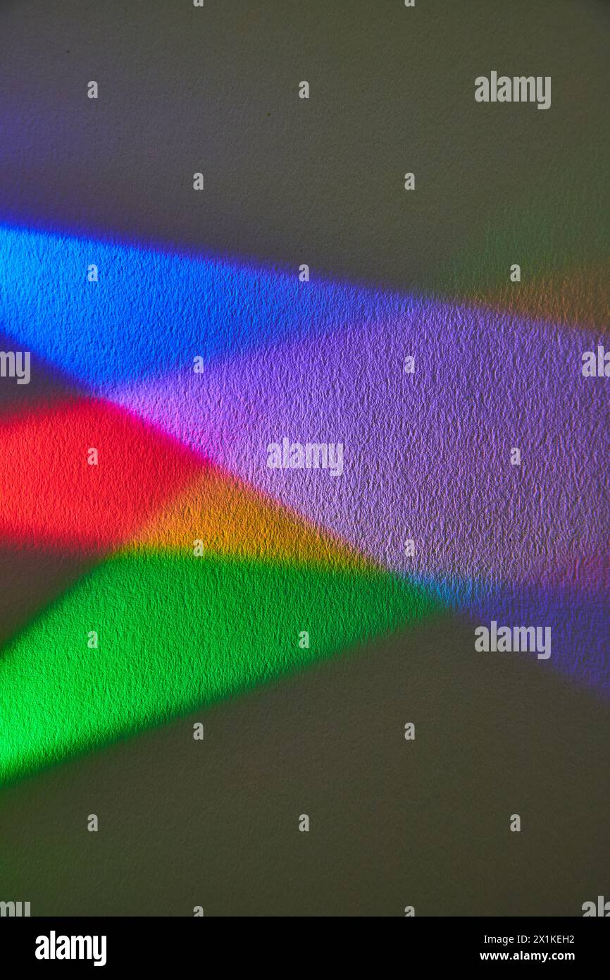 Rainbow Light Refraction on Textured Surface Stock Photo - Alamy
