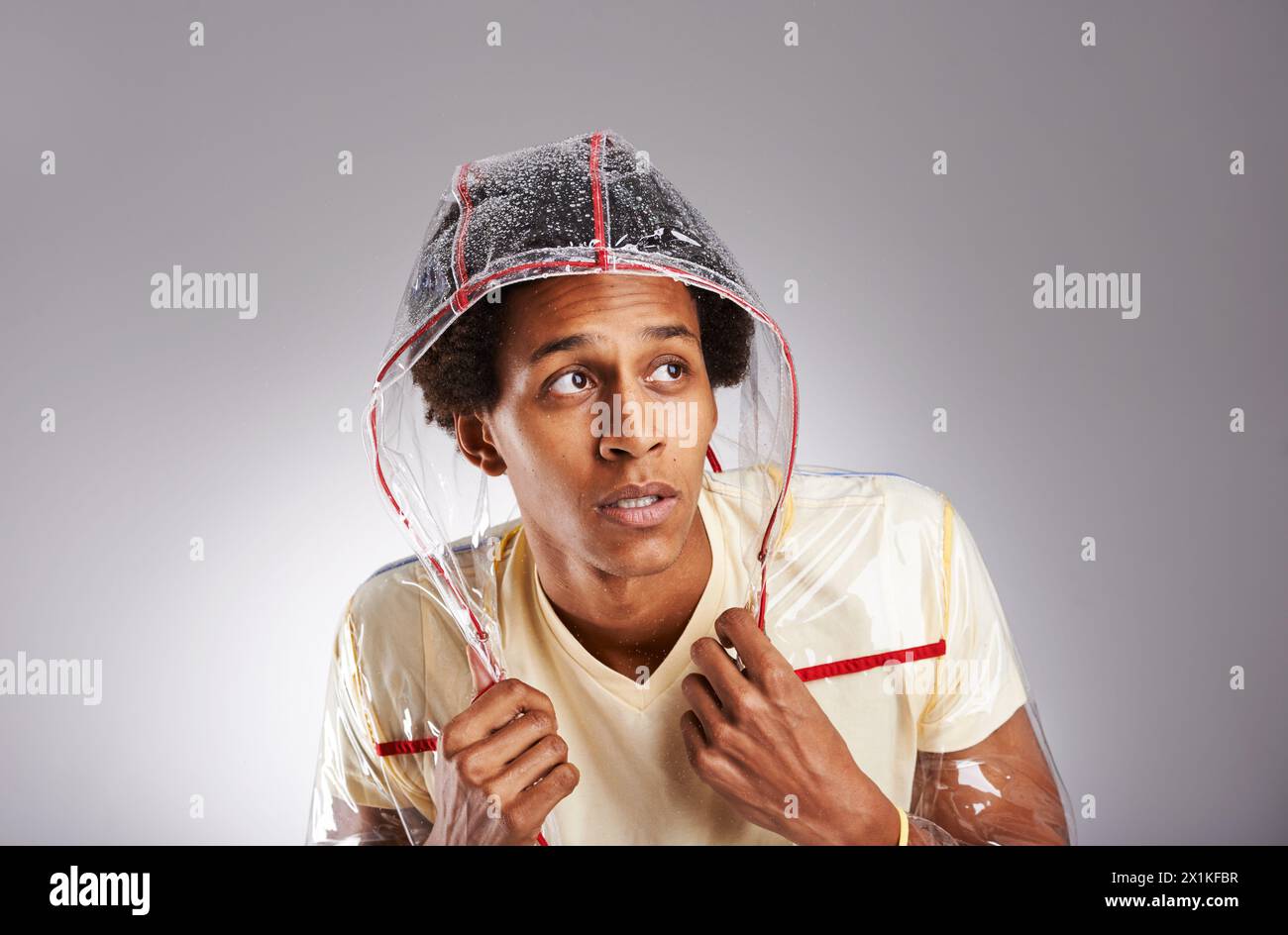 Cold, black man and studio with raincoat for fashion in winter with ...