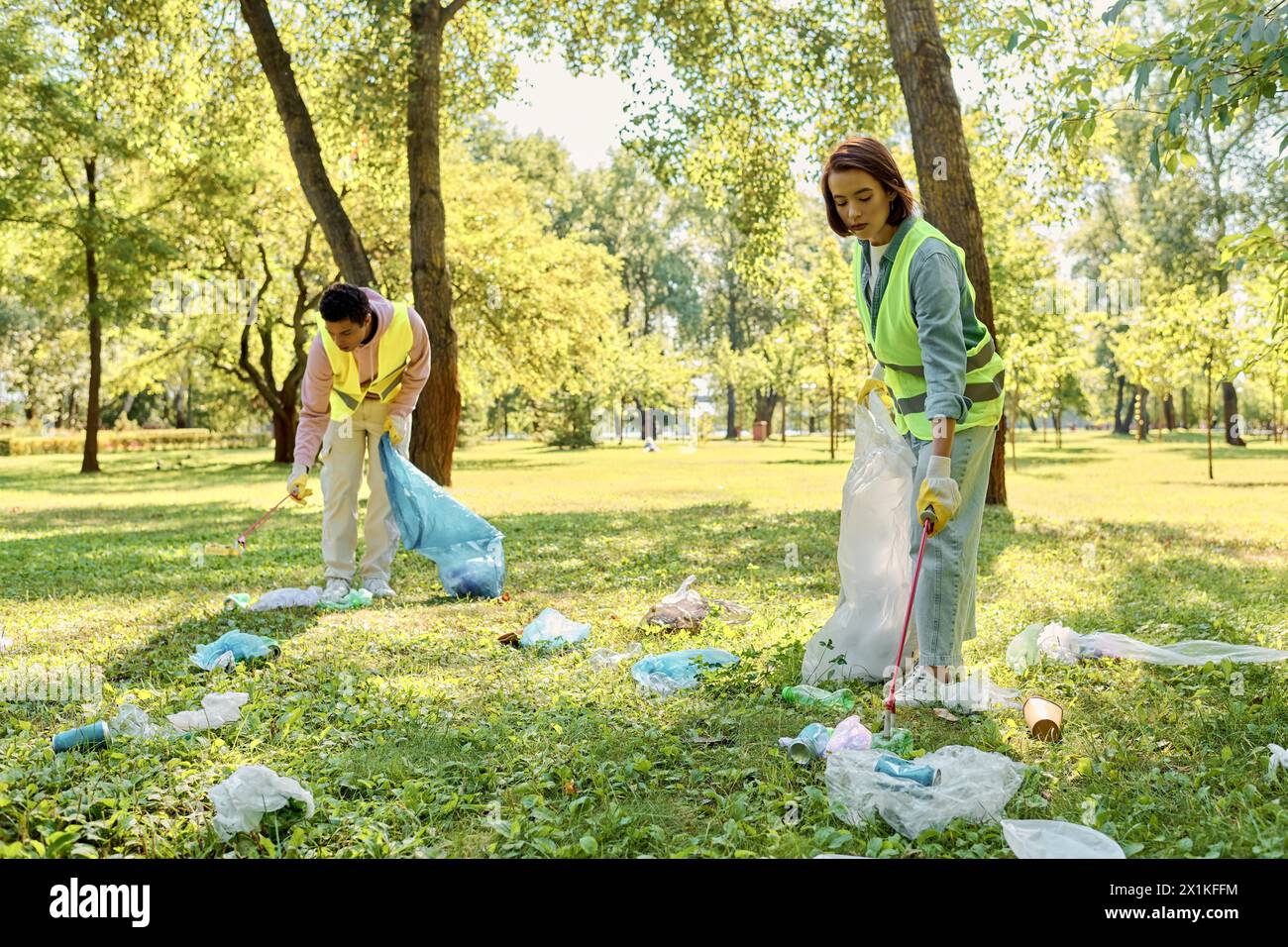 Socially active diverse loving couple in safety vests and gloves ...