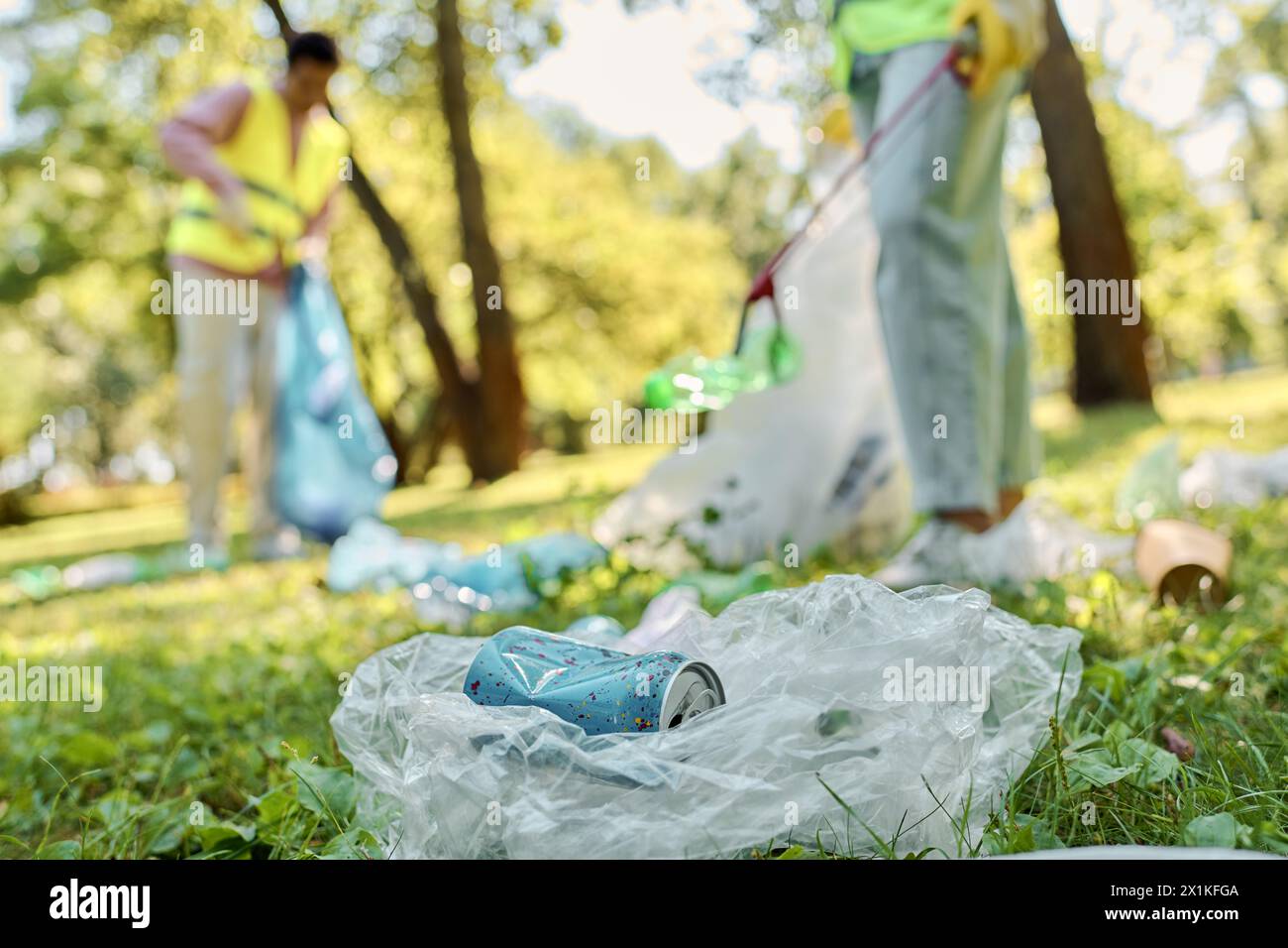 A socially active, diverse loving couple in safety vests and gloves ...