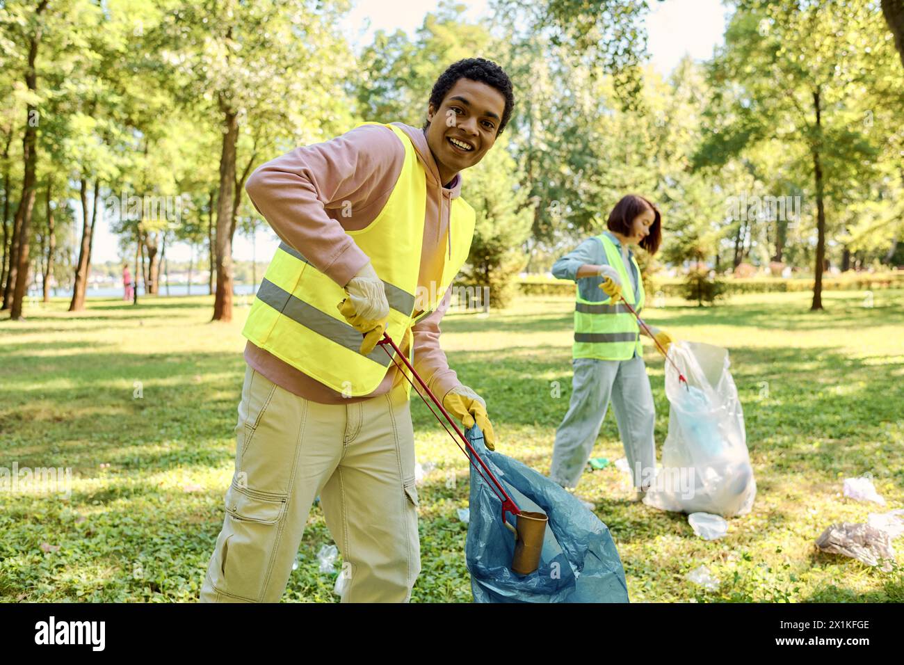 African american man in a yellow safety vest holds a blue bag while ...