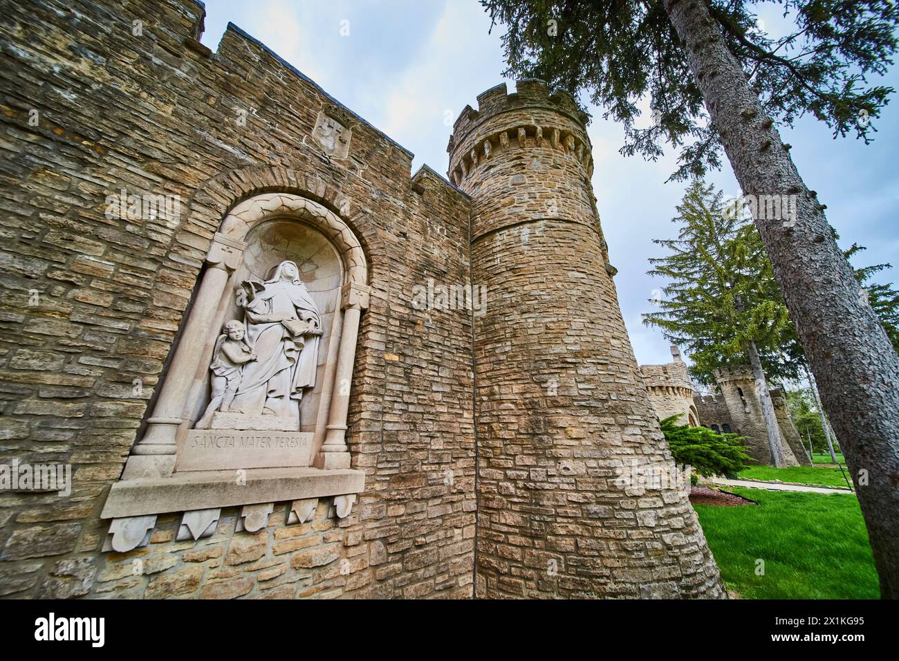 Medieval Stone Tower and Saint Teresa Statue, Bishop Brute College ...