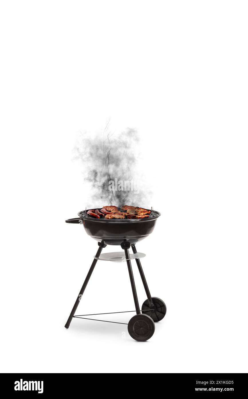 Burnt grilled meat on a barbecue with smoke isolated on white ...