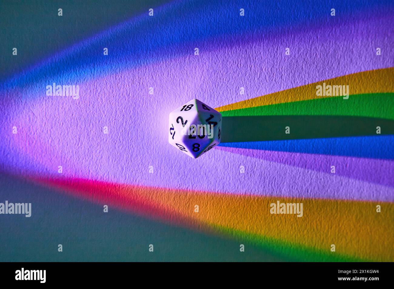 Colorful Spectrum Shadow from White D20 Die on Textured Surface Stock ...