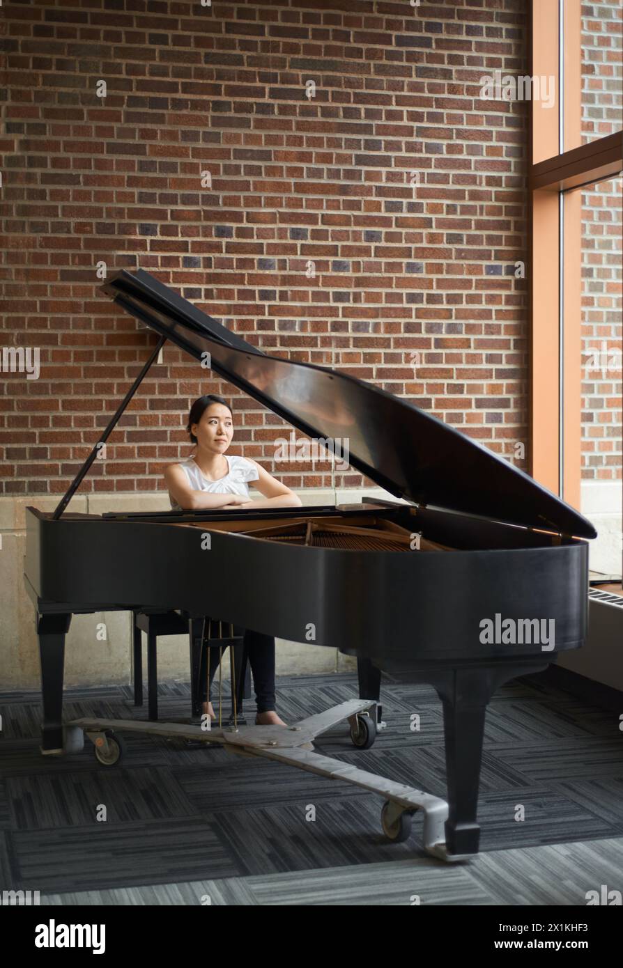 Piano, musician or woman in a house for music training in an artistic ...