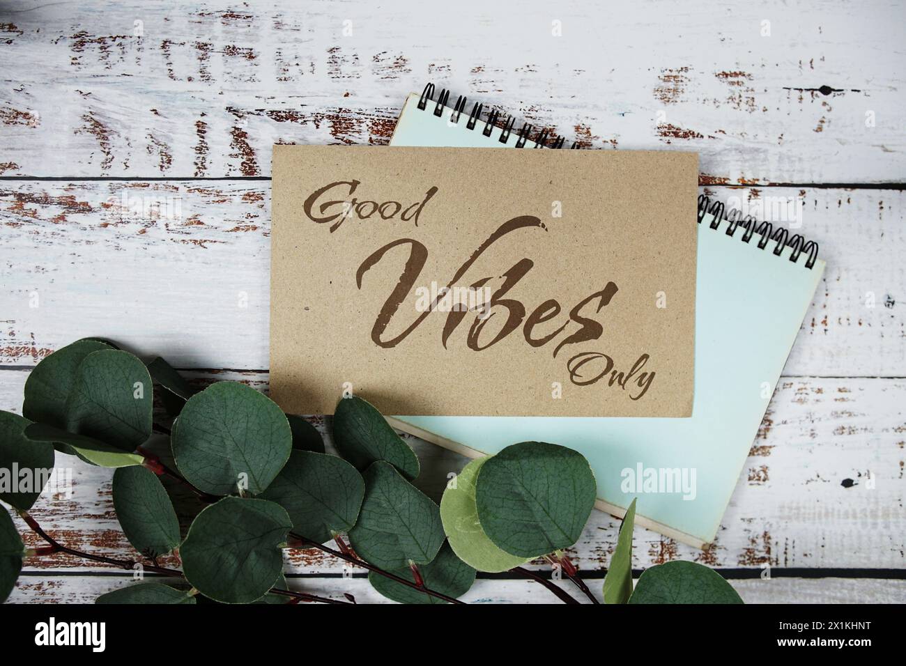 Good Vibes only text message on paper card with flowers border frame on ...