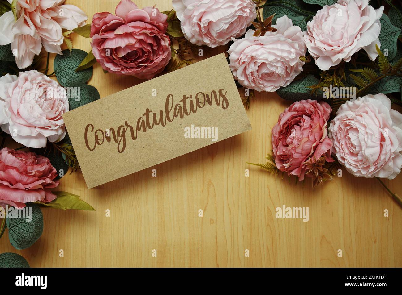 Congratulations text message on paper card with flowers border frame on ...