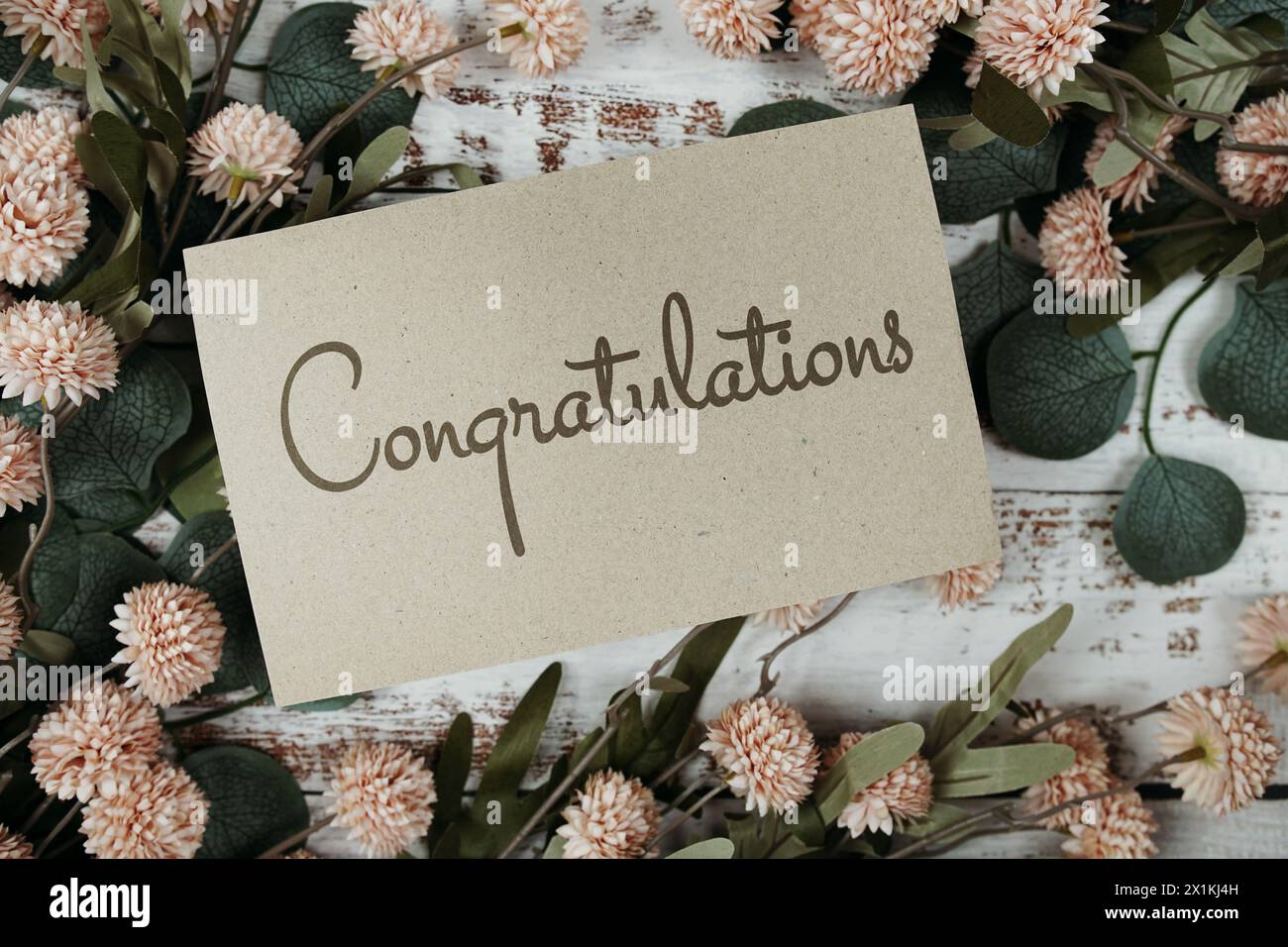 Congratulations text message on paper card with flowers border frame on ...
