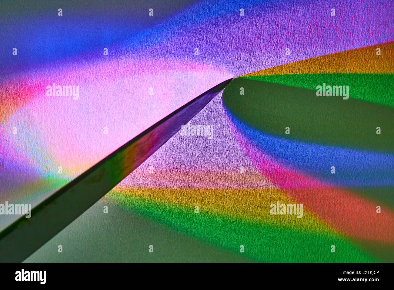 Abstract Knife Edge with Rainbow Light Play Stock Photo - Alamy