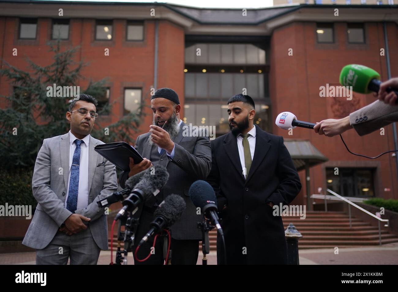 Community leader and solicitor Shahbon Hussain (centre) with Mohammed ...
