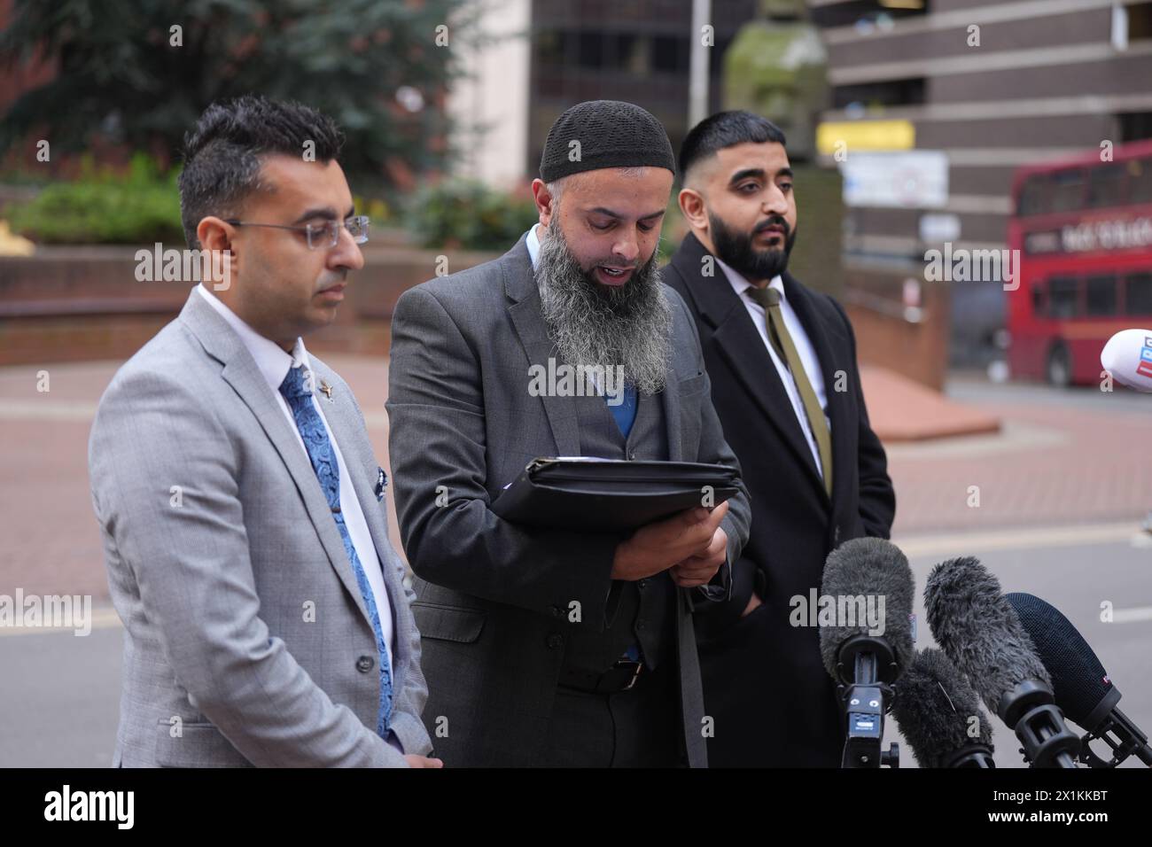 Community leader and solicitor Shahbon Hussain (centre) with Mohammed ...