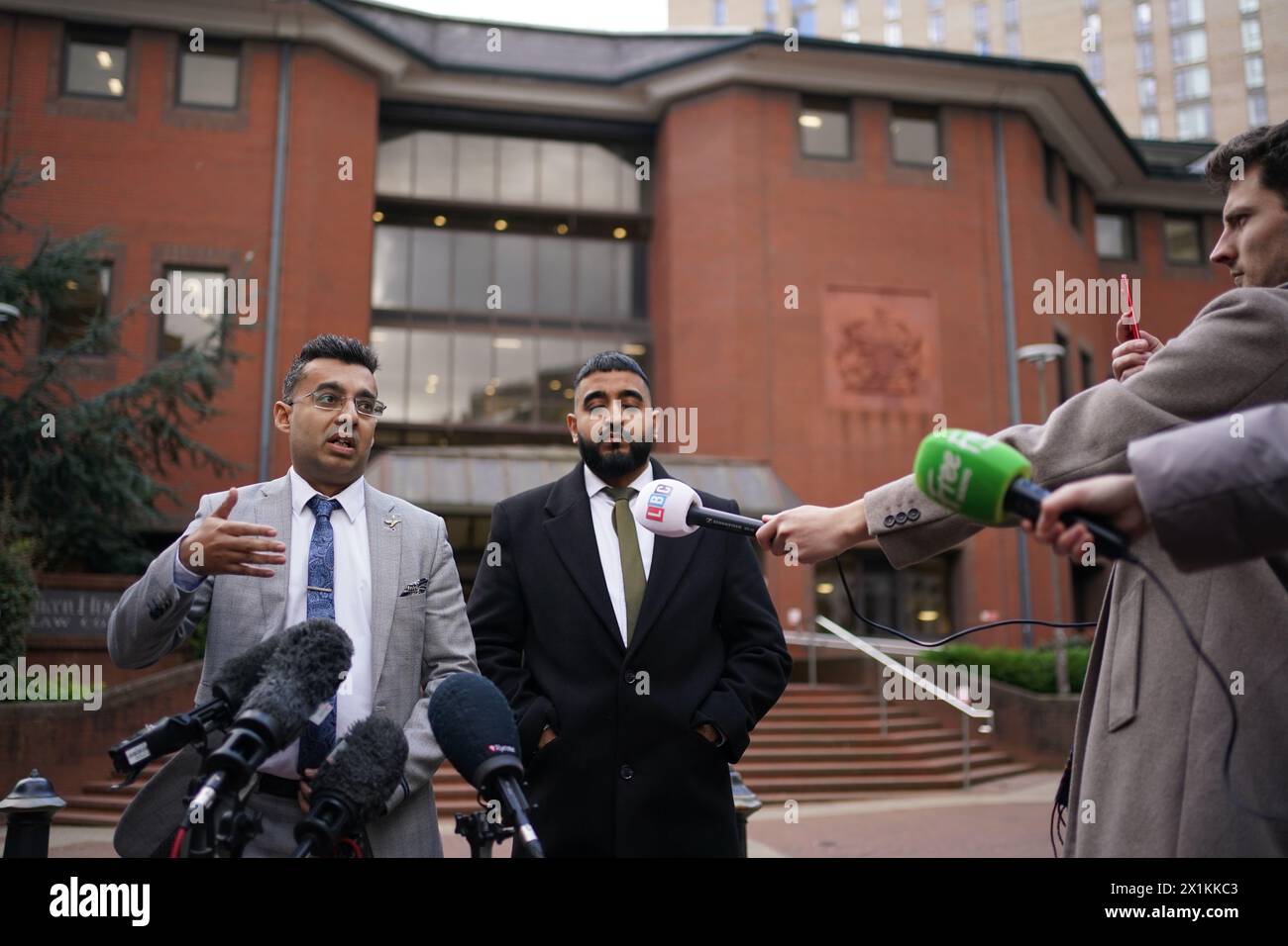 Mohammed Ayaz (left) and Adnaan Riaz, the sons of victim Mohammed Rayaz ...