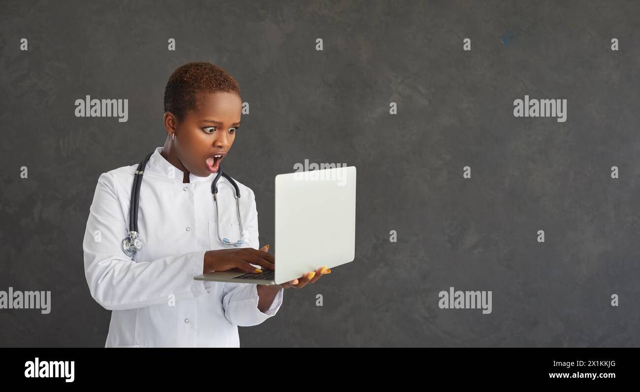 Female doctor, student or intern with a scared and surprised face looks ...