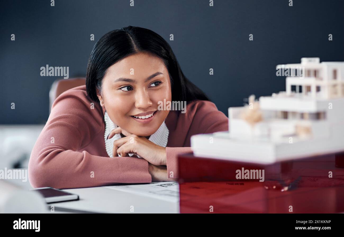Woman, architect and thinking by model for design in office with ideas ...