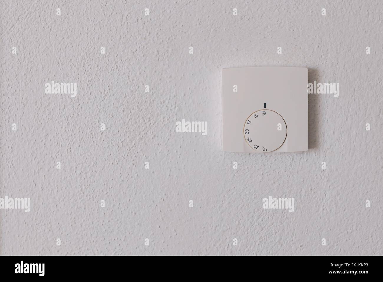 Thermostat with the external and target temperatures indicated. Rotary ...