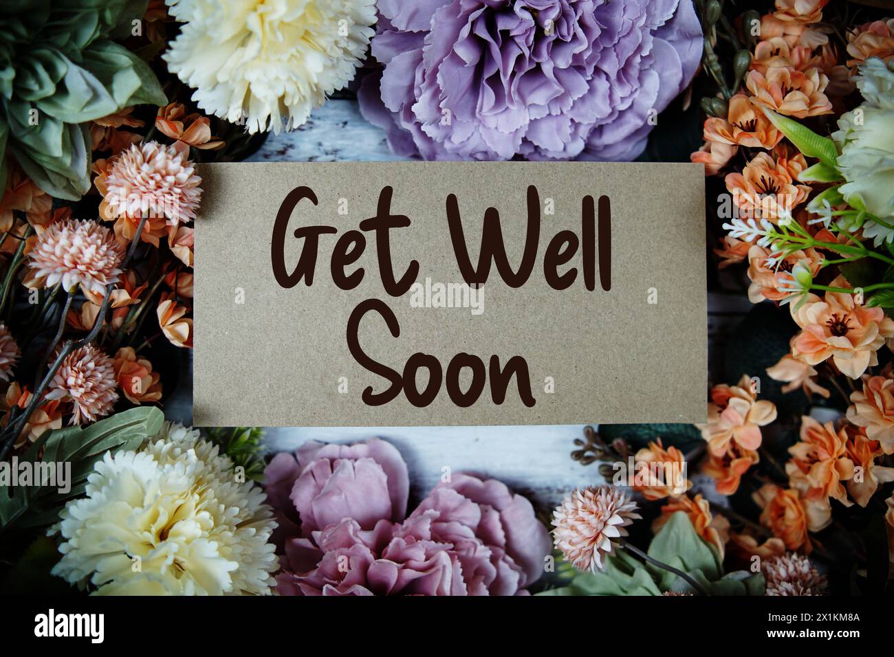 Get well Soon typography text with flower decorated on wooden ...