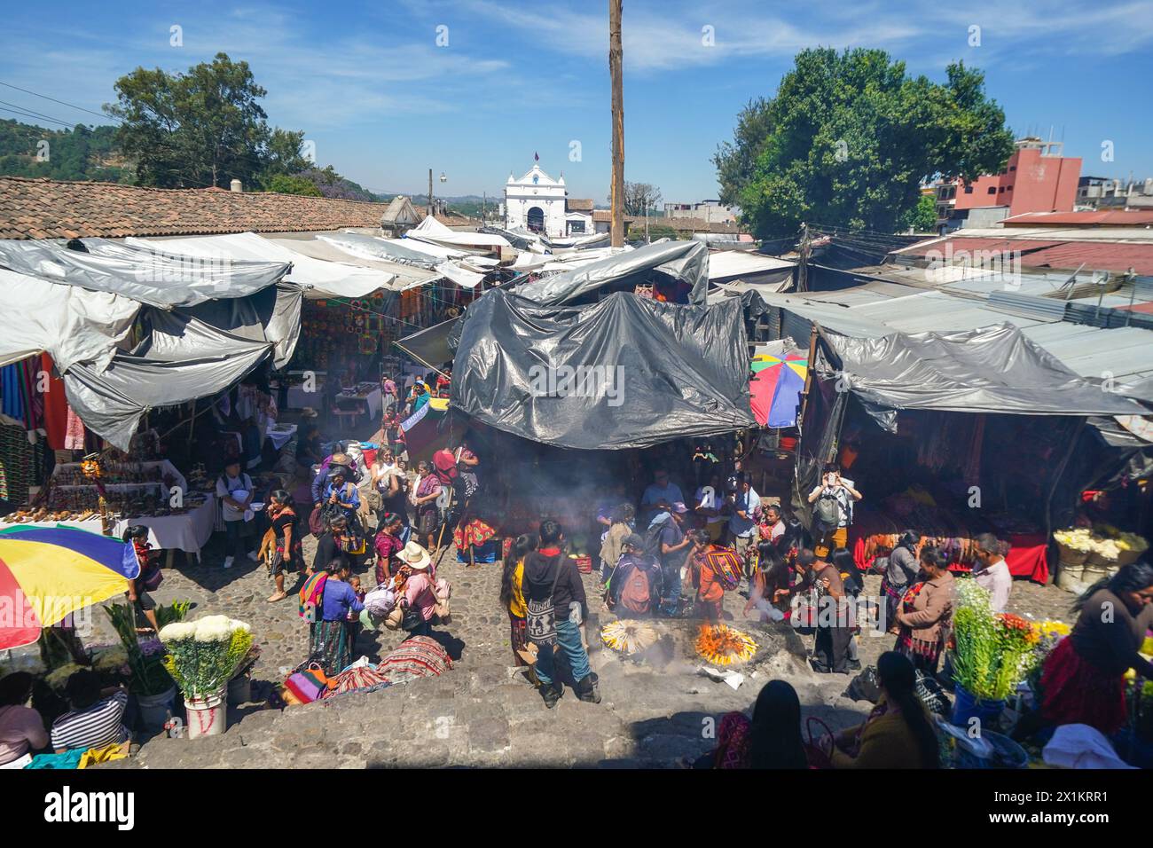View of the weekly market and the El Calvario chapel in ...