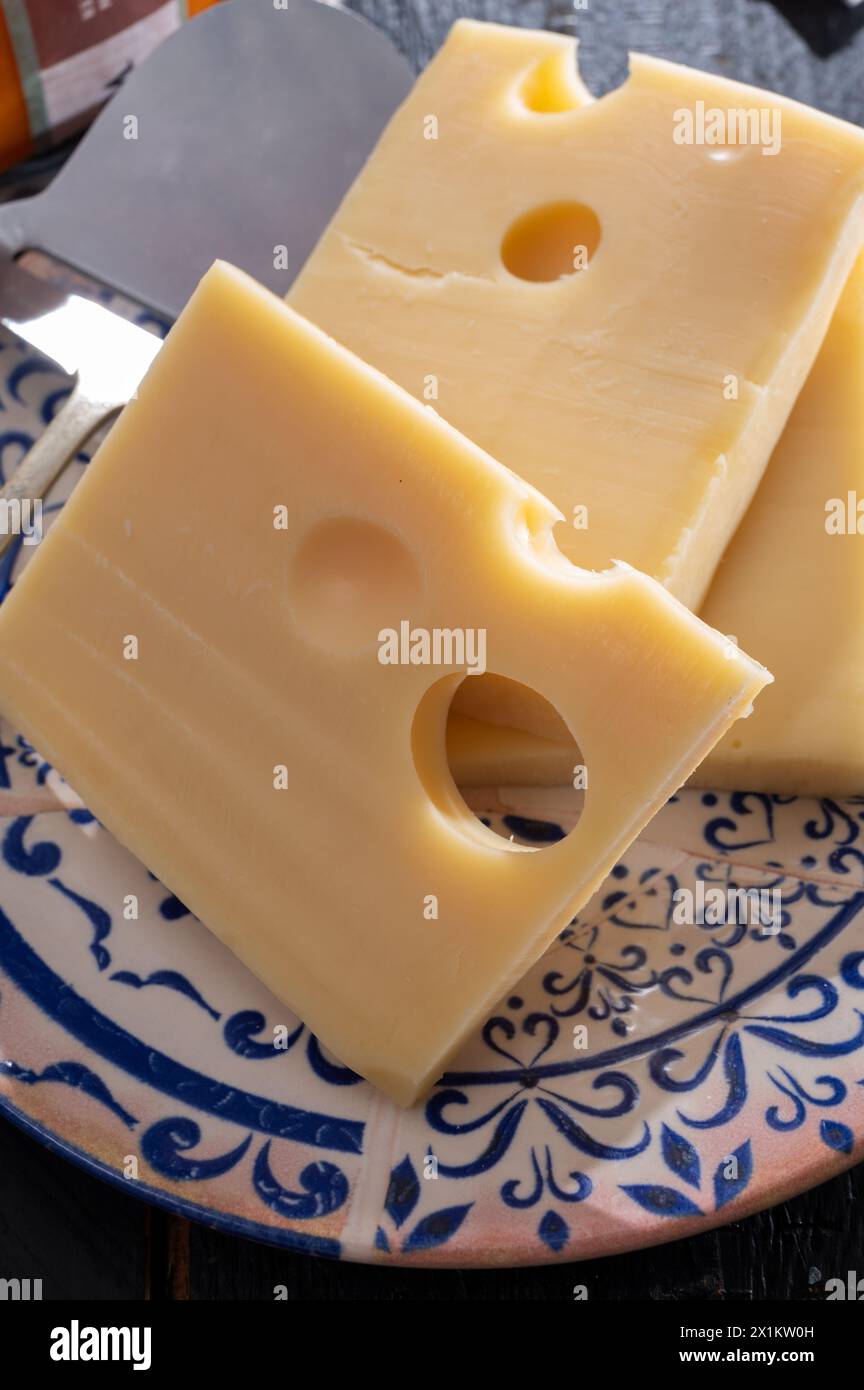 Swiss cheese collection, yellow emmentaler or emmental cheese with ...