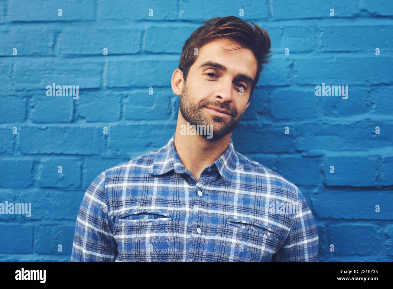 Man, confident in portrait and relax on wall background, casual fashion ...