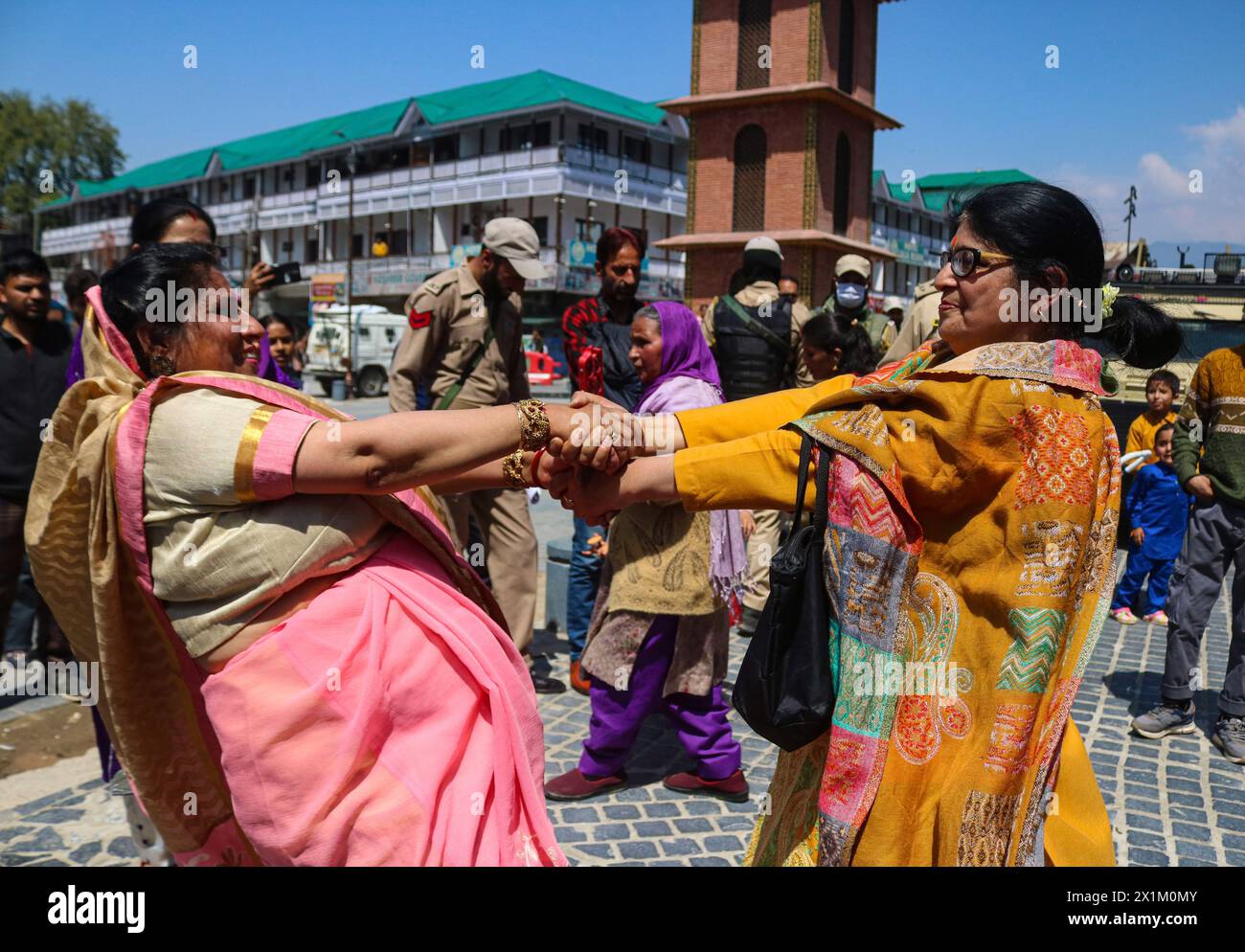 Srinagar, India. 17th Apr, 2024. Hindu women devotees take part in a religious procession to ...
