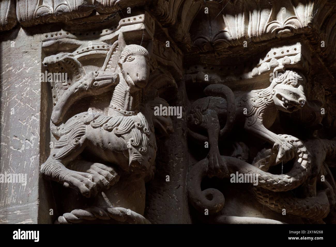 A lion fighting with a snake - Medieval Bestiary - Capital (12th ...