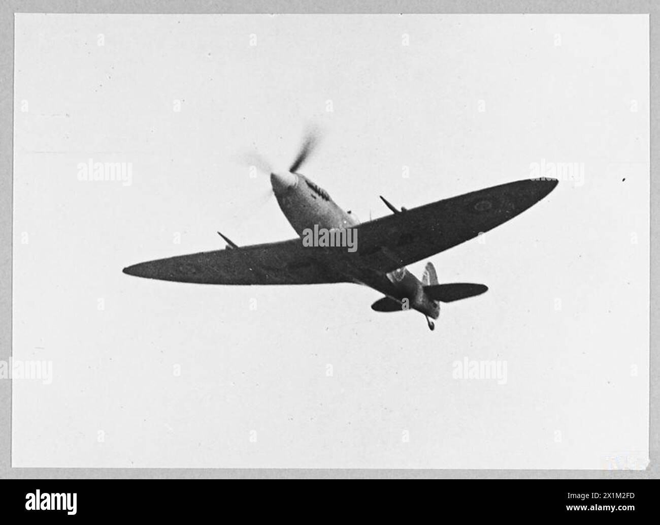 The improved Spitfire fighter aircraft is shown in flight ...