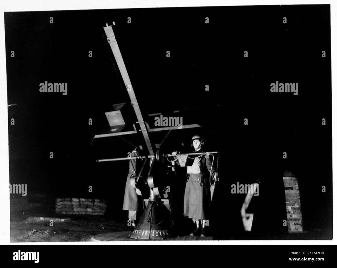 HOME GUARDS MAN A.A. BATTERY - The projector crews at their posts ...