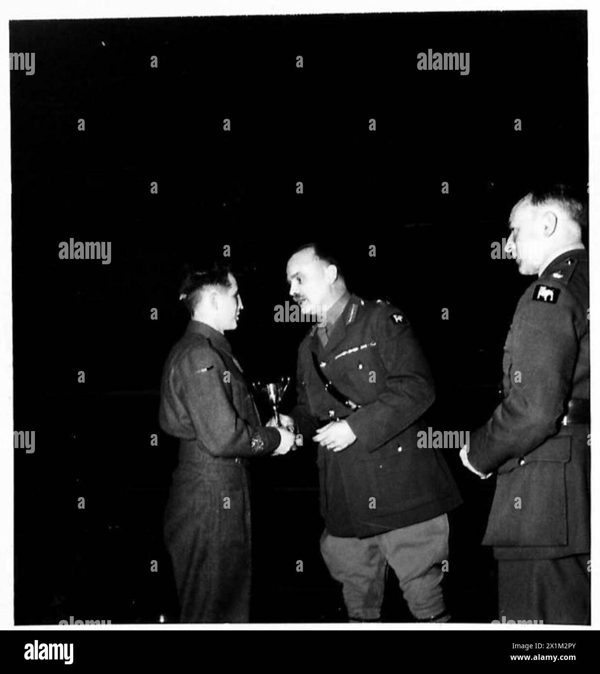 Major General H.R. Kerr presenting the Bantam Weight Championship Cup ...