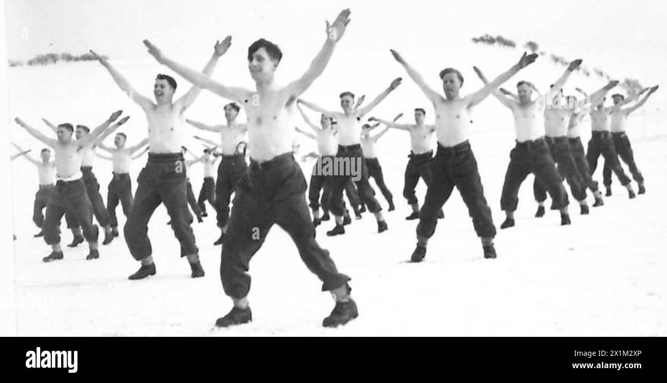 ROYAL MARINES HARDEN UP IN THE SNOW - Stripped to the waist the men do ...