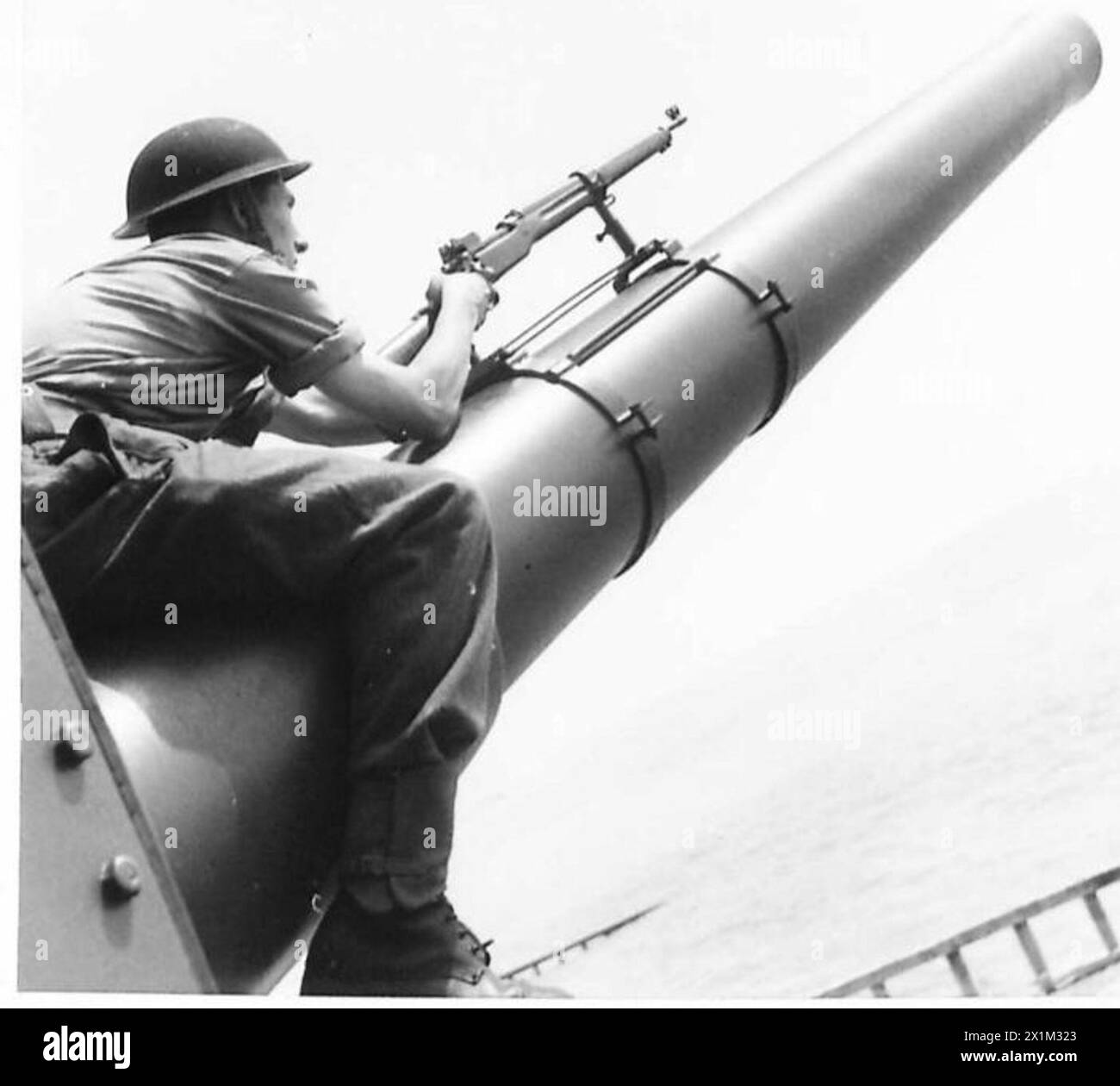 LIFE AT COASTAL DEFENCE BATTERIES - For training purposes a rifle is ...