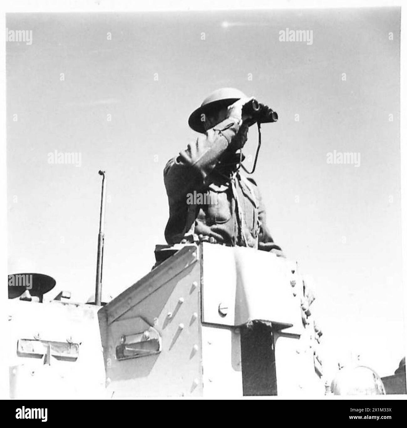 A GREEK ARMY IN TRAINING - The Commander of the Bren carrier looks ...