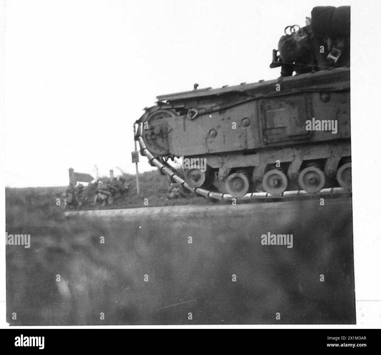 5TH DIVISION ADVANCE TOWARDS LUBECK - Troops, supported by tanks just ...