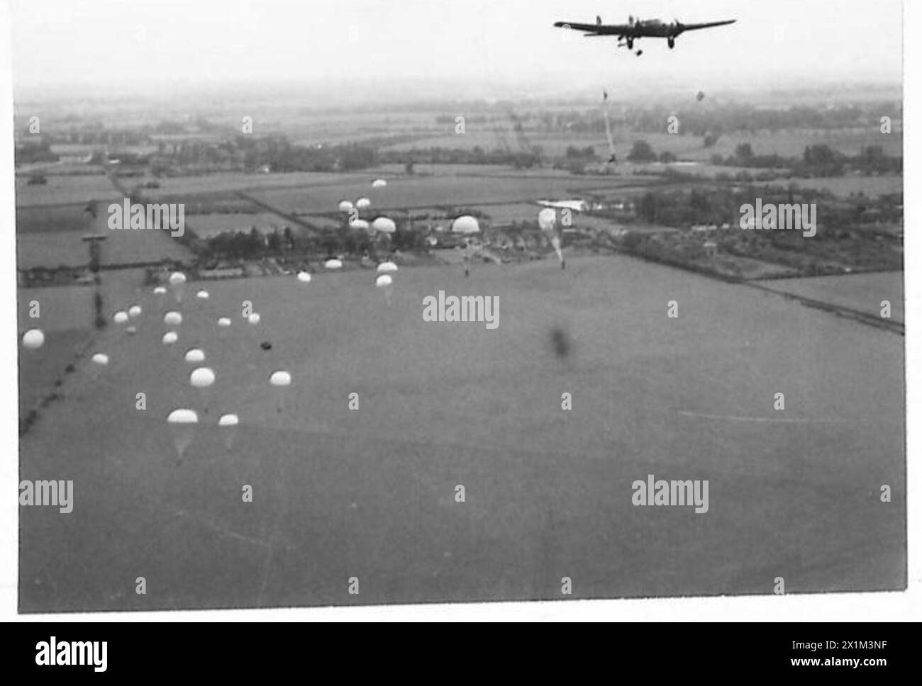 THE KING SEES PARACHUTE TROOPS IN ACTION - A picture from one of the ...