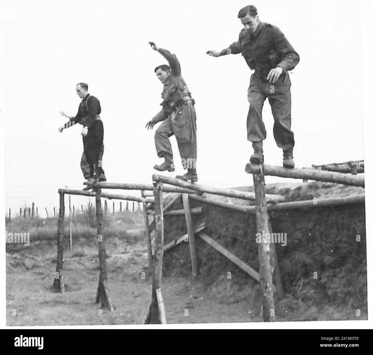 Riflemen of motor transport battalions navigate an obstacle course ...