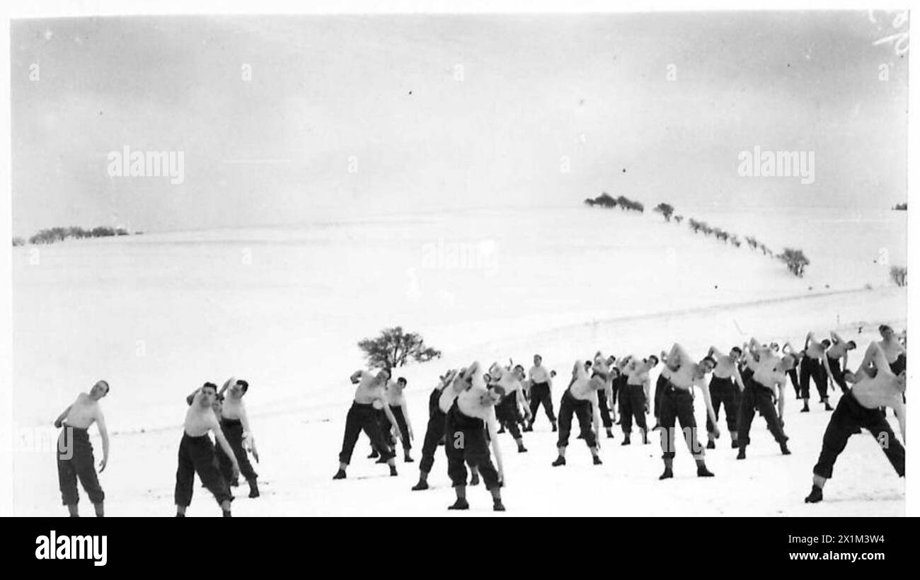 ROYAL MARINES HARDEN UP IN THE SNOW - Stripped to the waist the men do ...