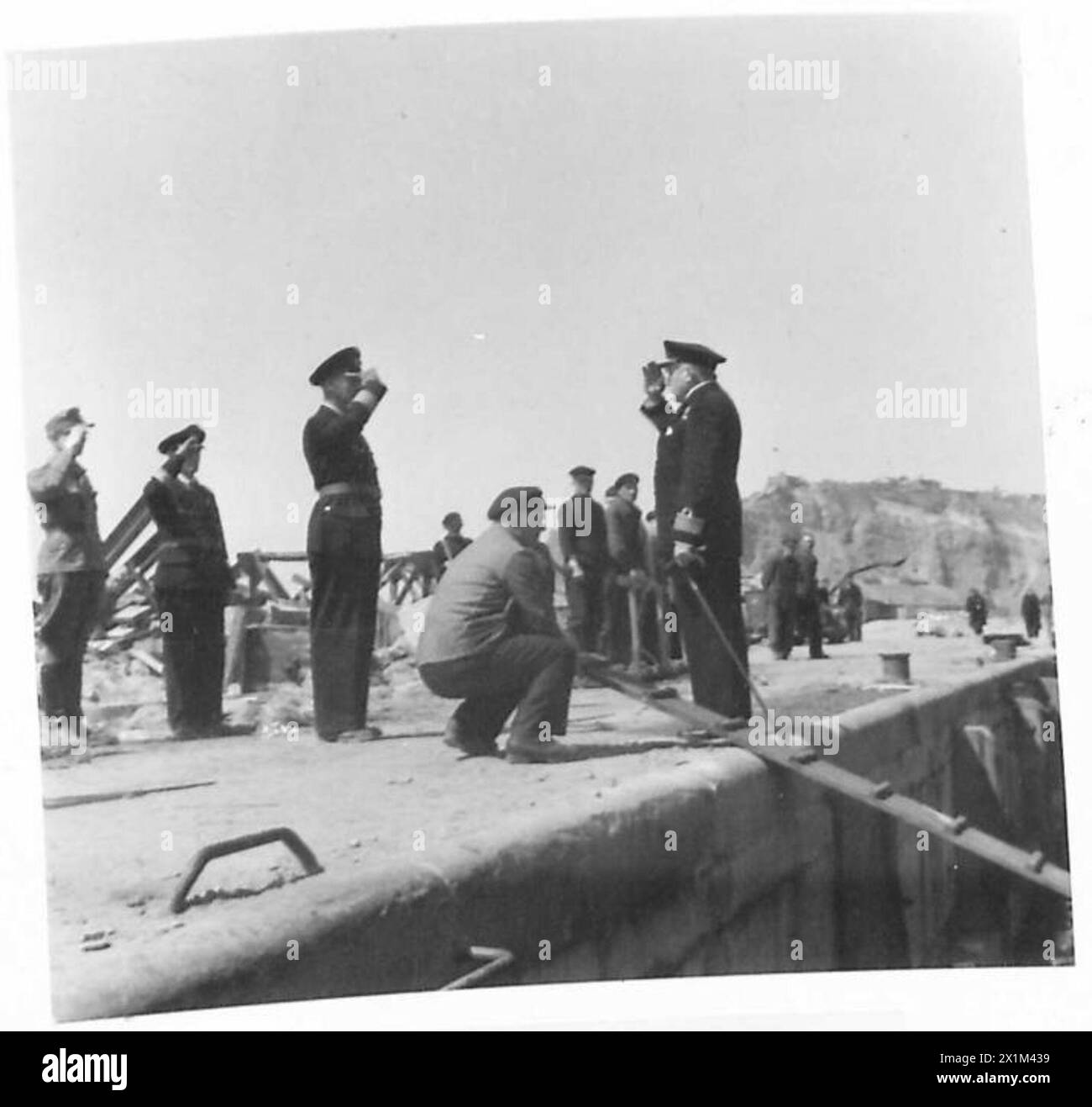 Admiral Muirhead-Gould was greeted by German Garrison Commander Captain ...