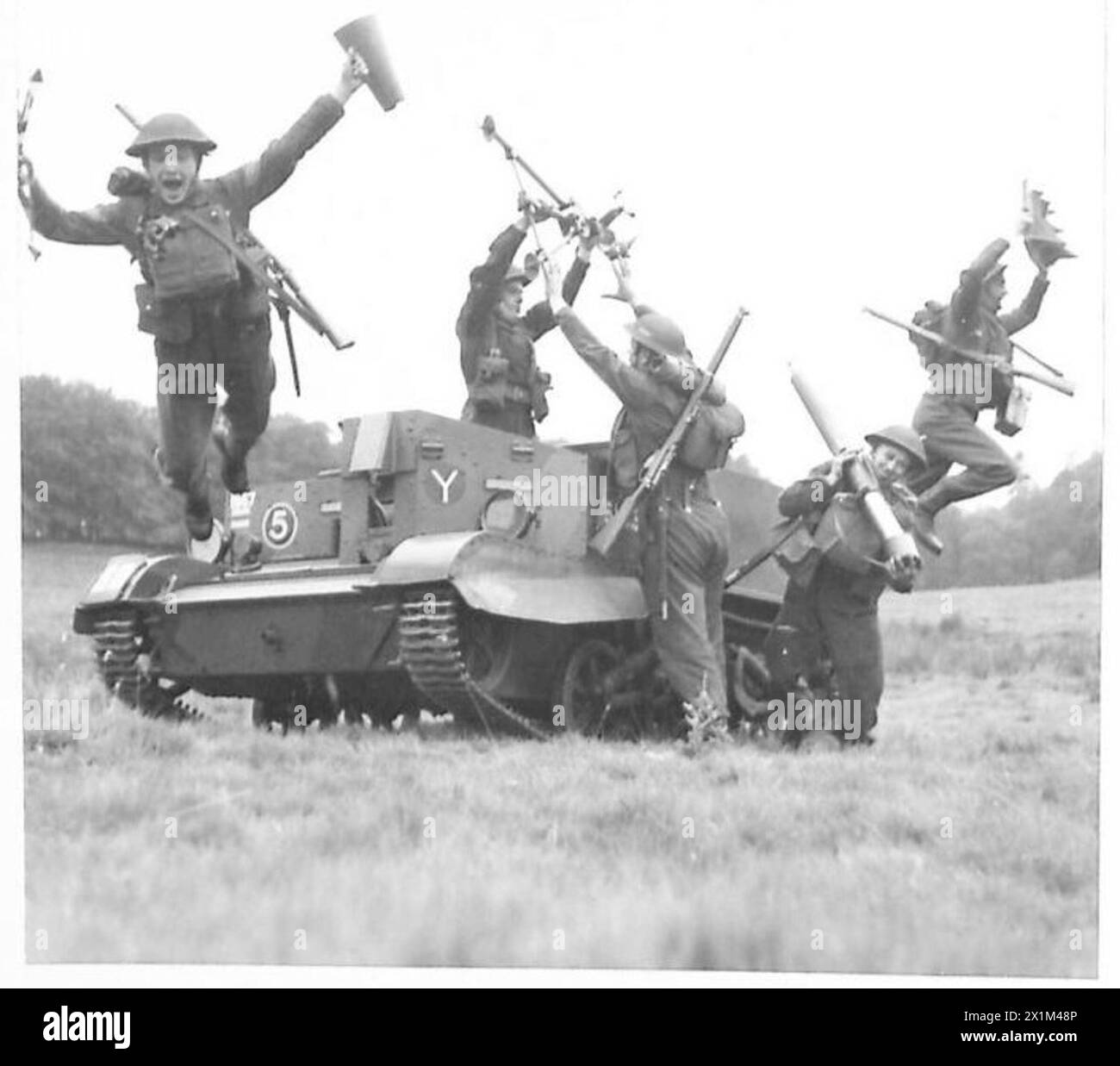 ACTION! - Men leaping from a Bren carrier with their respective parts ...