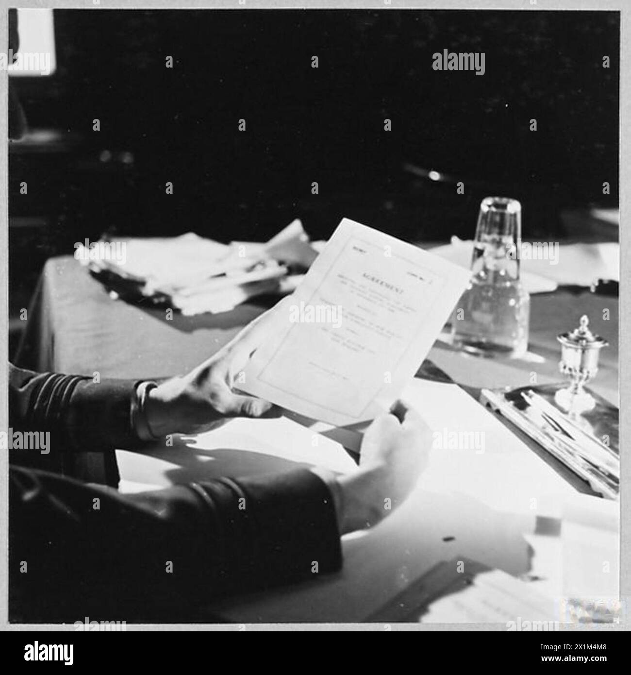 SIR ARCHIBALD SINCLAIR SIGNS THE EXTENSION OF THE EMPIRE AIR TRAINING ...