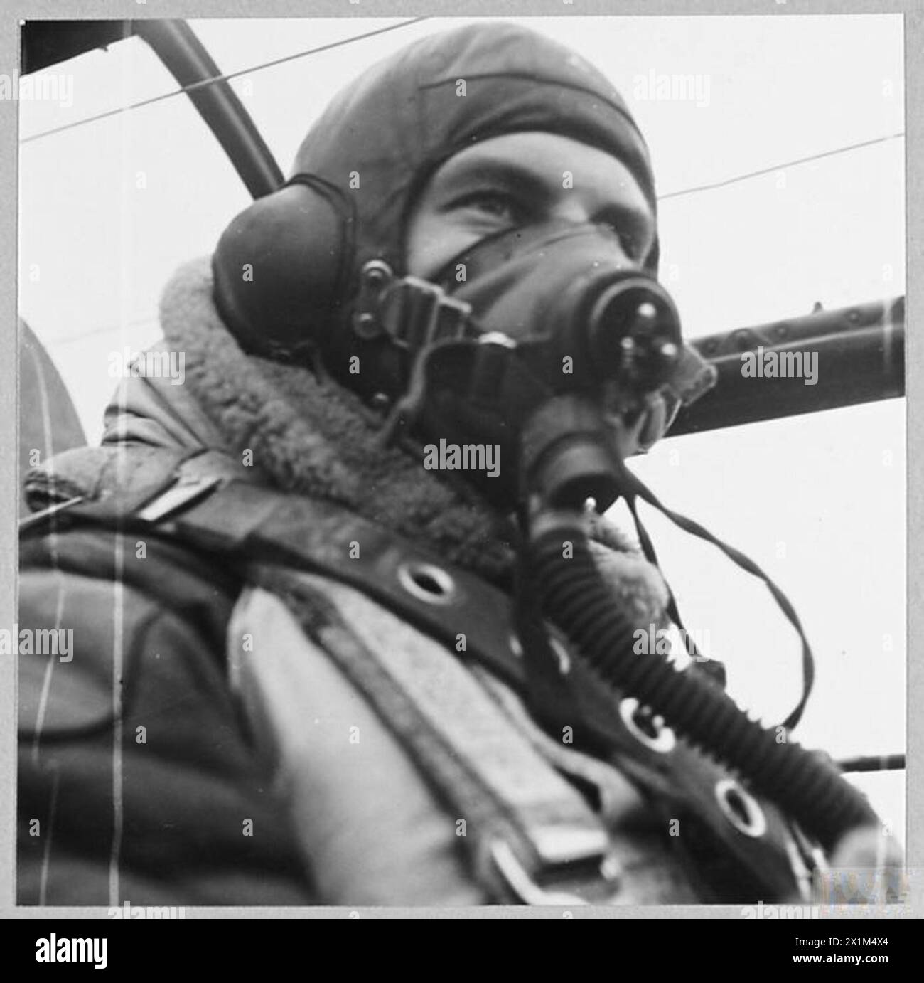 Squadron Leader R.G. Churcher, DFC & Bar, commands the Lancaster bomber ...