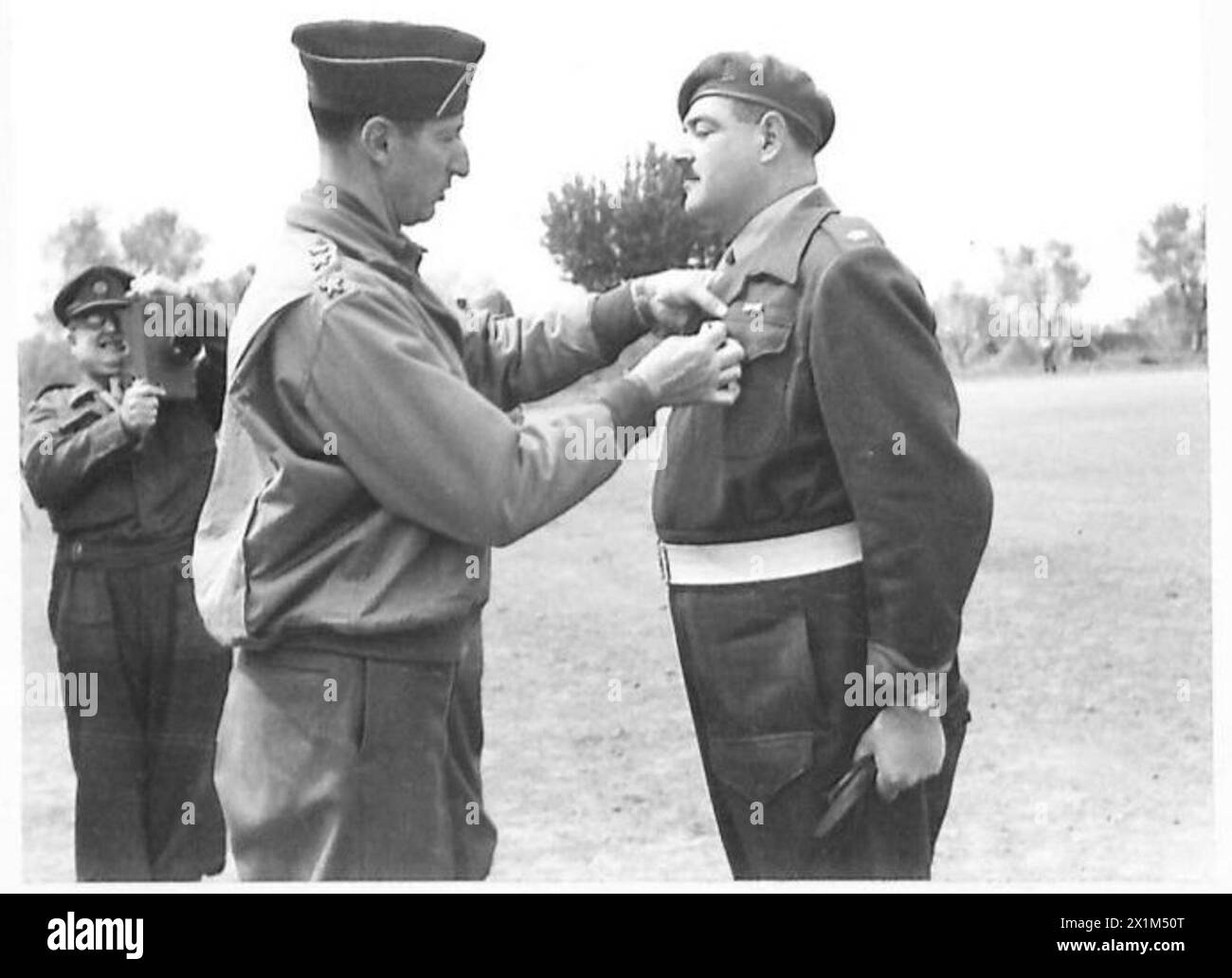 Major Leo Koenigsbert is awarded the Soldier's Medal by General Clark ...