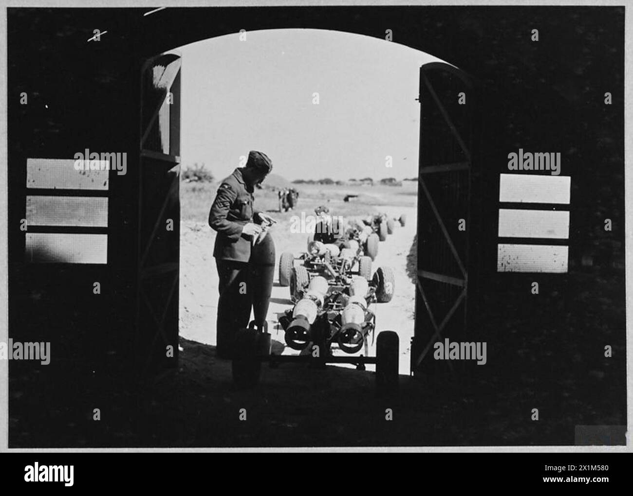 WITH A HUDSON OF COASTAL COMMAND - Leading a bomb-trailer from the bomb ...