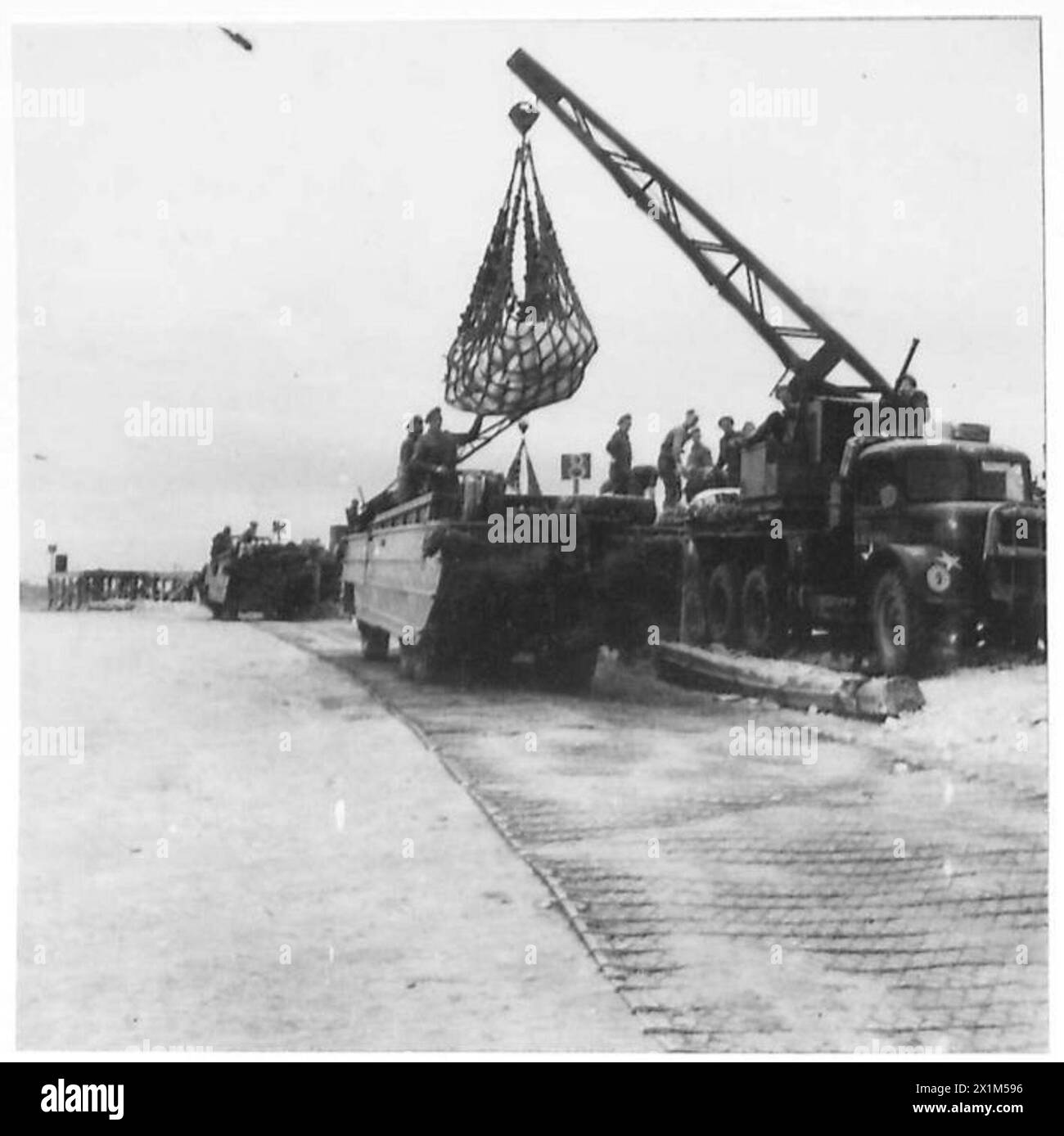 Loading and unloading military vehicles Black and White Stock Photos ...
