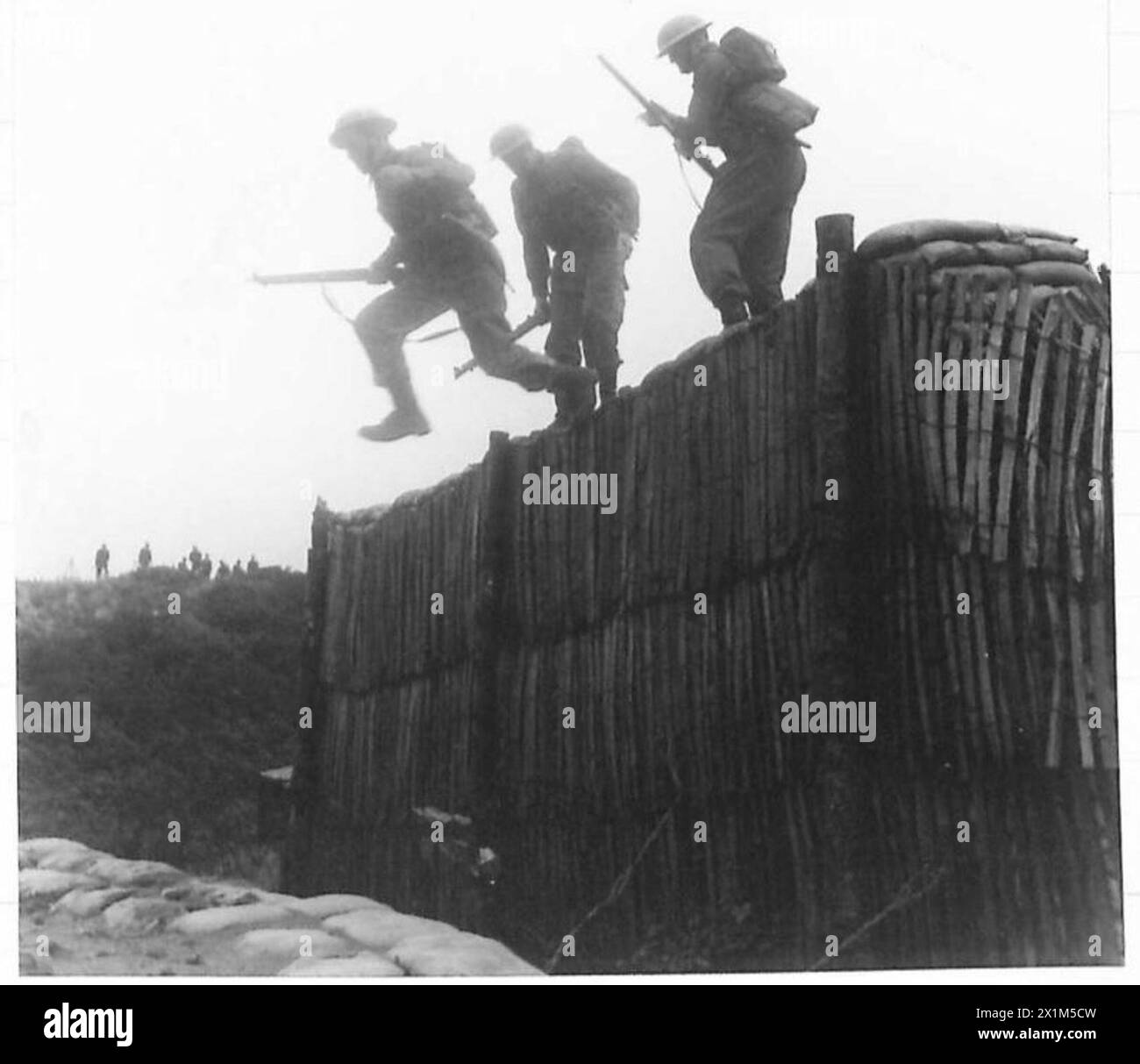 TOUGHENING-UP AT A WEAPON TRAINING SCHOOL - Jumping a ten foot wall is ...